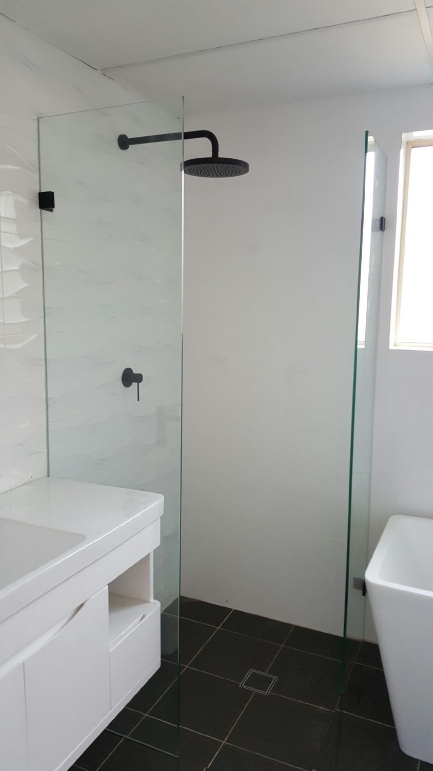 Frameless Fixed Panels with Black Fittings | Pro Shower screens and Wardrobes